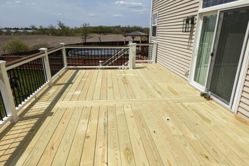 Pressure Treated Pine Decking with Trex Railings Round Lake - Rock ...